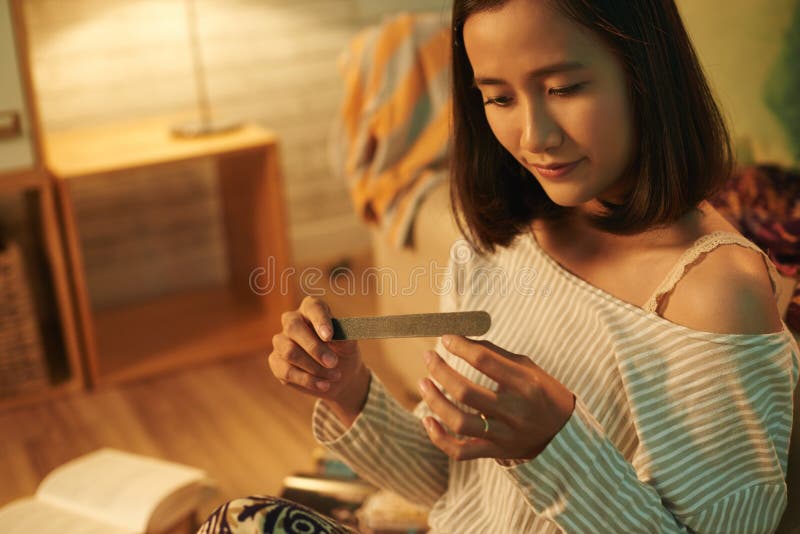 Filing nails stock photo. Image of leisure, feminine - 60087990