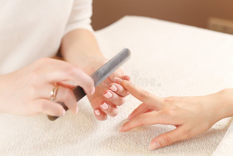 Filing Nails Process in Spa Salon Stock Photo - Image of fingernail ...