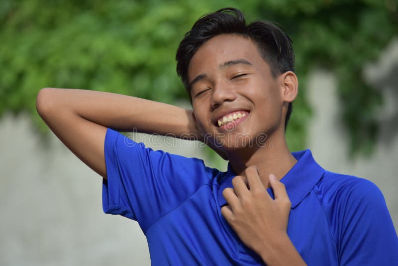 A Filipino Boy Relaxing stock photo. Image of youth - 141590386