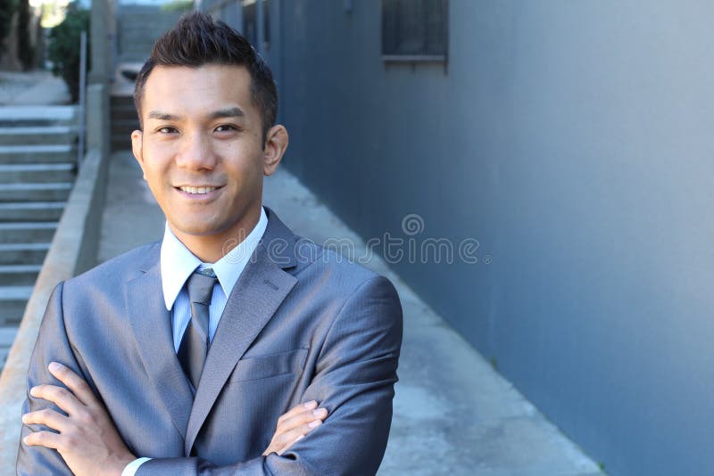 A Happy Filipino Professional With A Confident Look ( On A Red Brick ...