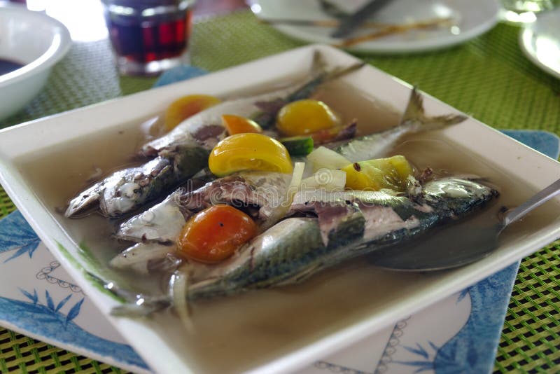 Fish Paksiw Wrapped In Mango Leaves- Filipino Favorite Stock Photo ...