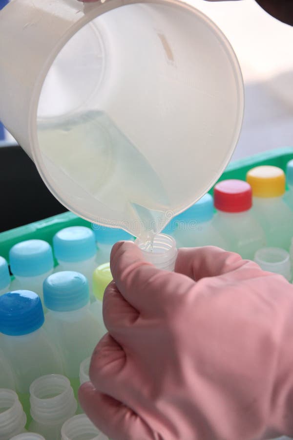 Fill chemical in bottle. stock image. Image of yellow - 30031549