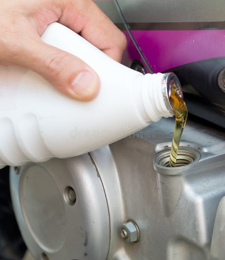 Fill fresh oil to engine stock image. Image of scooter - 51132701