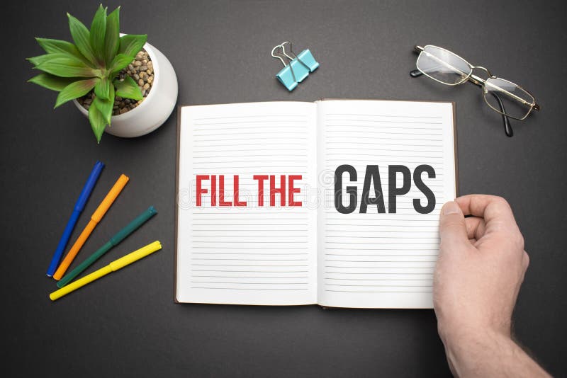 FILL the GAPS Text on the Notebook with Businessman S Hands Stock Image ...