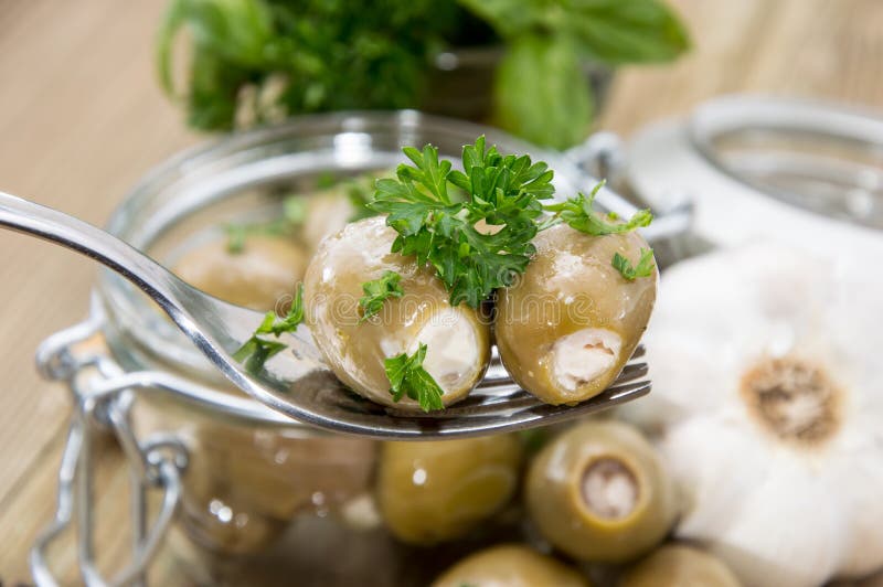 Filled Olives on a fork stock photo. Image of cutlery - 26750378