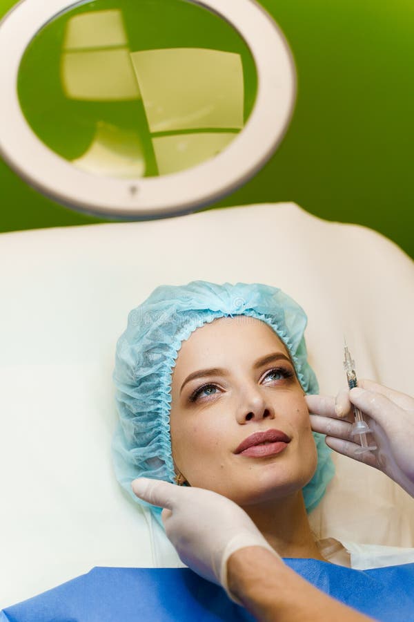 Filler Injection in Cheekbones. Contour Plastic for Correcting the ...