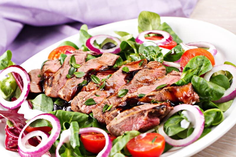 Fillet of beef with salad stock photo. Image of greek - 340955556