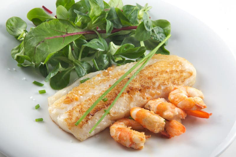 Fillet of fish and salad stock image. Image of green - 17805653