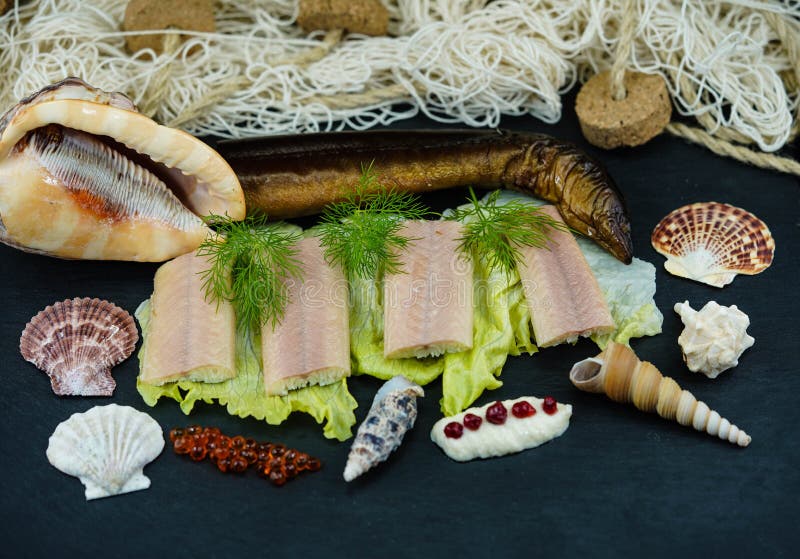 Smoked eel fillet stock photo. Image of delicacy, prepared - 206496270