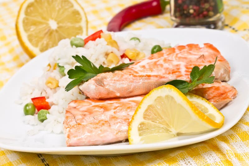 Fillet of Salmon and Rice with Vegetables Stock Image - Image of ...