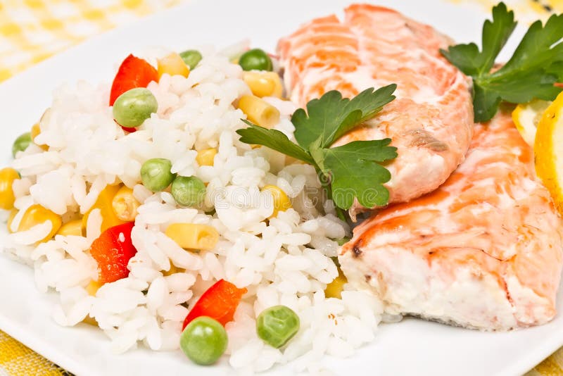 Fillet of Salmon and Rice with Vegetables Stock Image - Image of ...