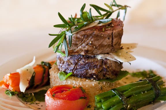 Fillet tower on Rosti stock image. Image of fillet, rosemary - 20588647