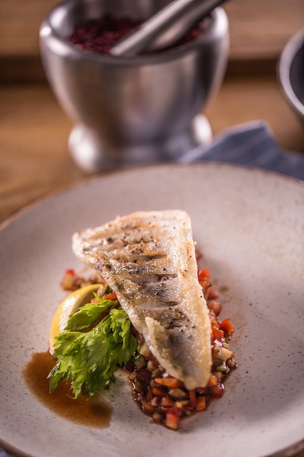 Fillet of Zander with Vegetables on a Plate in a Restaurant Stock Photo ...