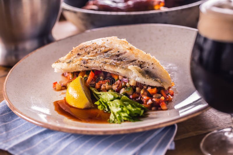 Fillet of Zander with Vegetables on a Plate in a Restaurant Stock Photo ...