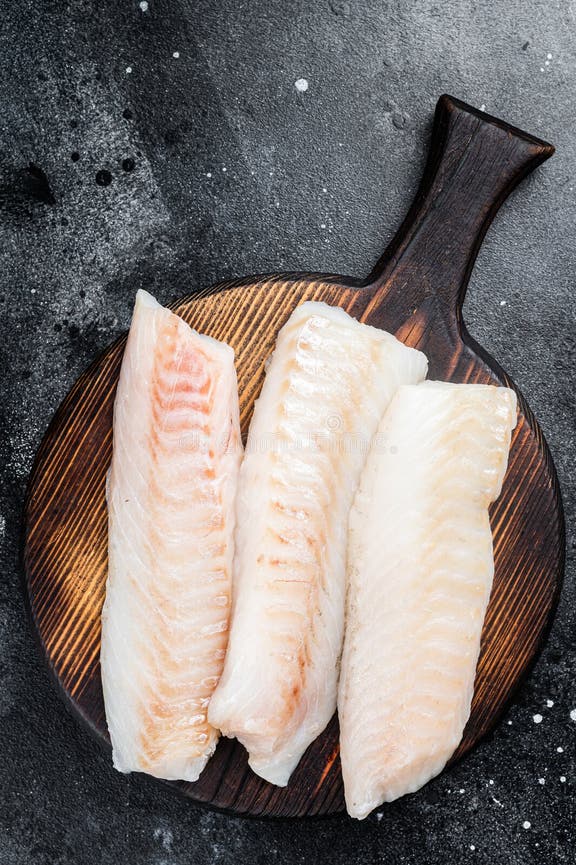 Fillets of Codfish, Raw Cod Fish Meat. Black Background Stock Image ...