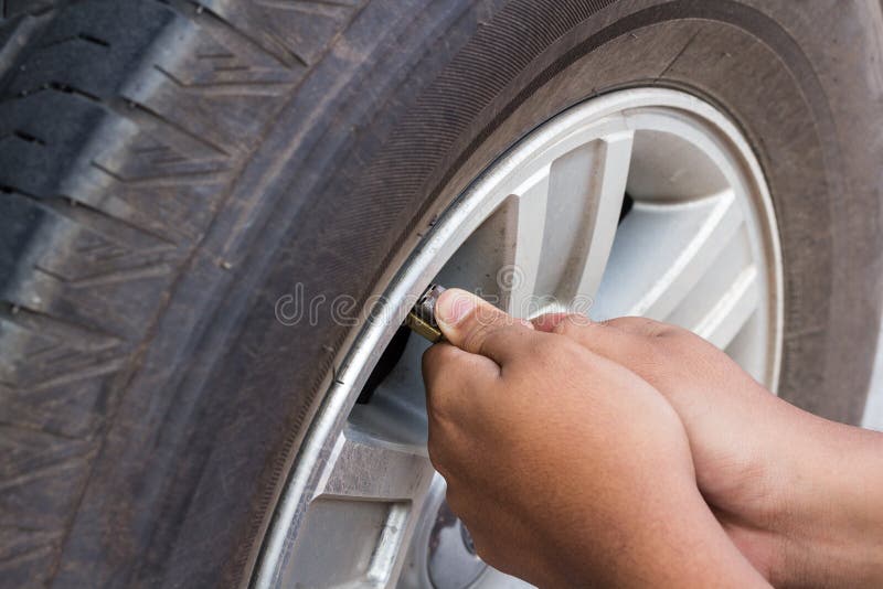 Filling Air into a Car Tire Stock Image - Image of inflate, travel ...