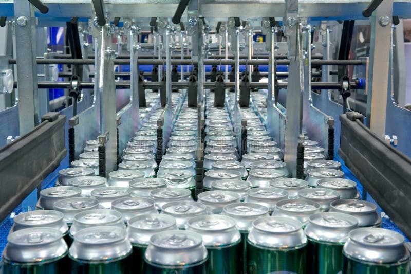 Filling of beverage cans stock image. Image of recycling - 19691361