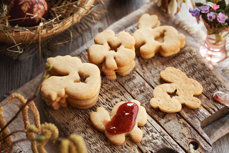 Filling Bunny Shaped Linzer Easter Cookie with Strawberry Jam Stock ...