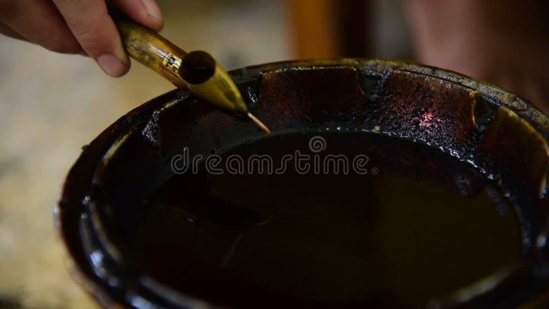 Filling Canting with Wax for Making Batik Stock Footage - Video of ...