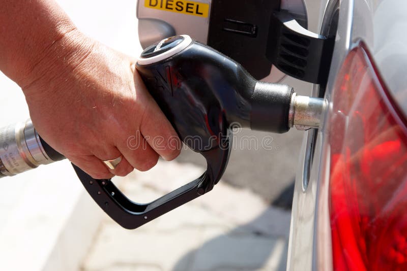 Filling the car stock photo. Image of daytime, diesel - 20909554