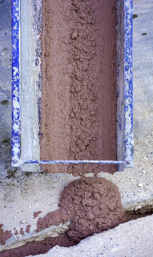 Filling with Colored Concrete of Excavation with a Narrow Section Stock ...