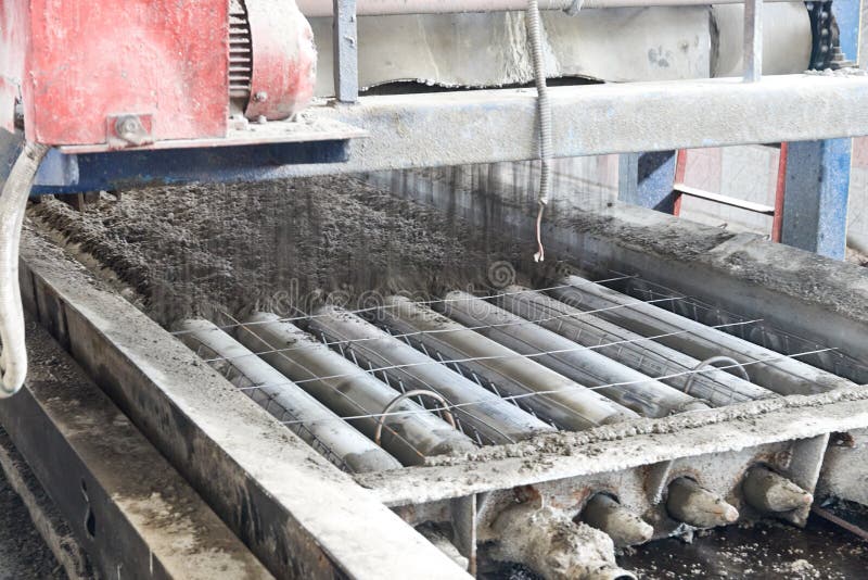 Filling with Concrete of Form during Production of Floor Slabs Stock ...