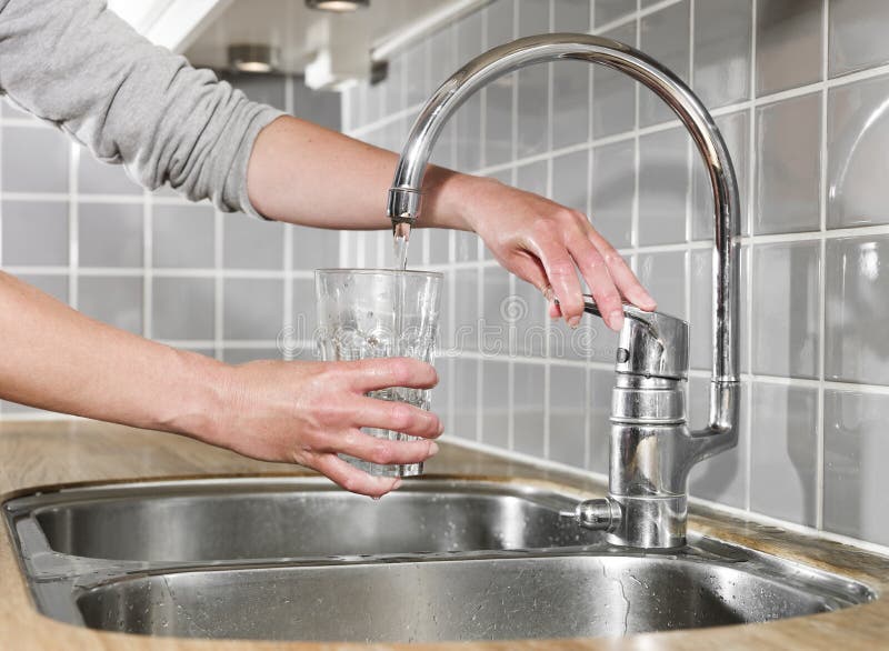 Filling a glass of water stock image. Image of streaming - 14762915