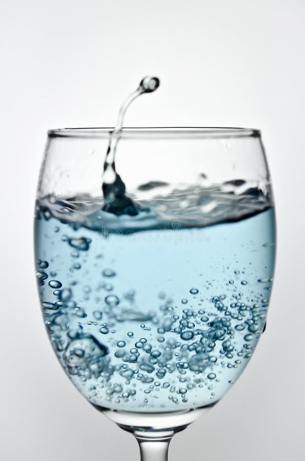 Filling a glass with water stock image. Image of aqua - 31736779