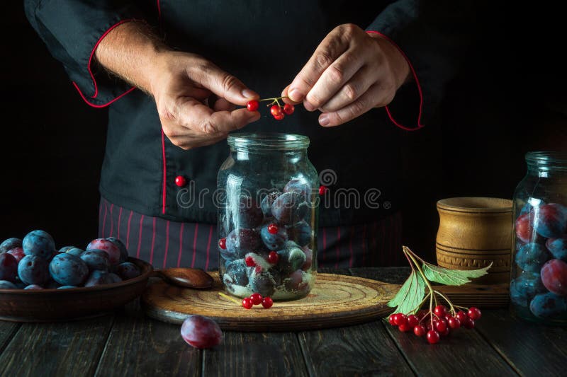 Filling the Jar with Viburnum Berries. Preparing a Sweet Drink from ...