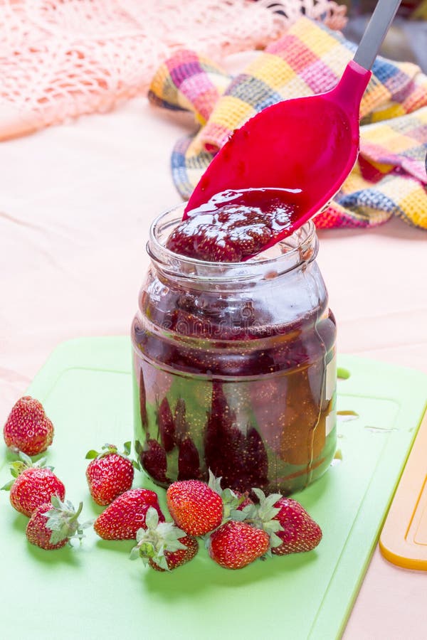 Filling Jars Strawberry Jam Stock Photo - Image of appetizing, closeup ...