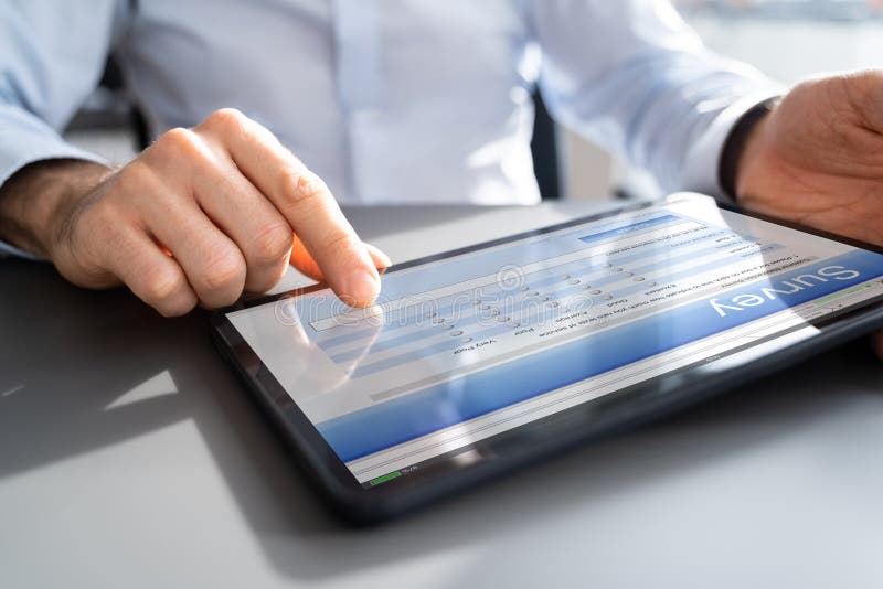 Filling Online Survey Form or Questionnaire Poll Stock Photo - Image of ...