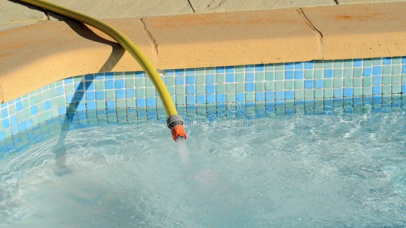Filling a pool with water stock video. Video of water - 35497444