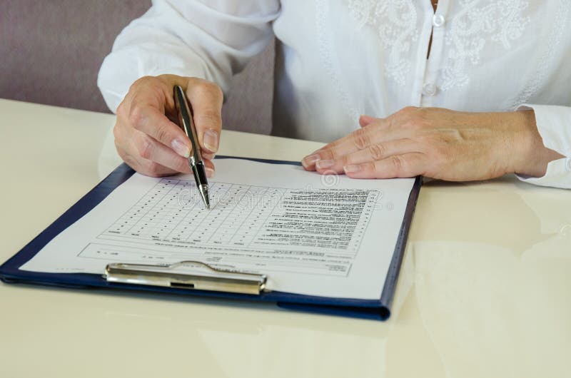 Filling in questionnaire stock photo. Image of concept - 56909400