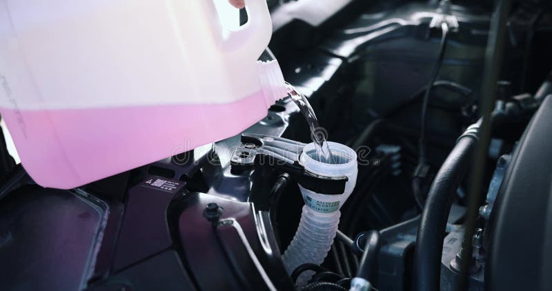 Filling the Tank of Car Windshield Washer Fluid Stock Footage - Video ...