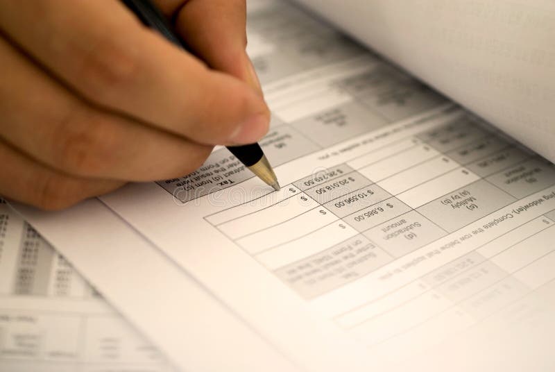 Filling in the tax form stock image. Image of form, loan - 2471965