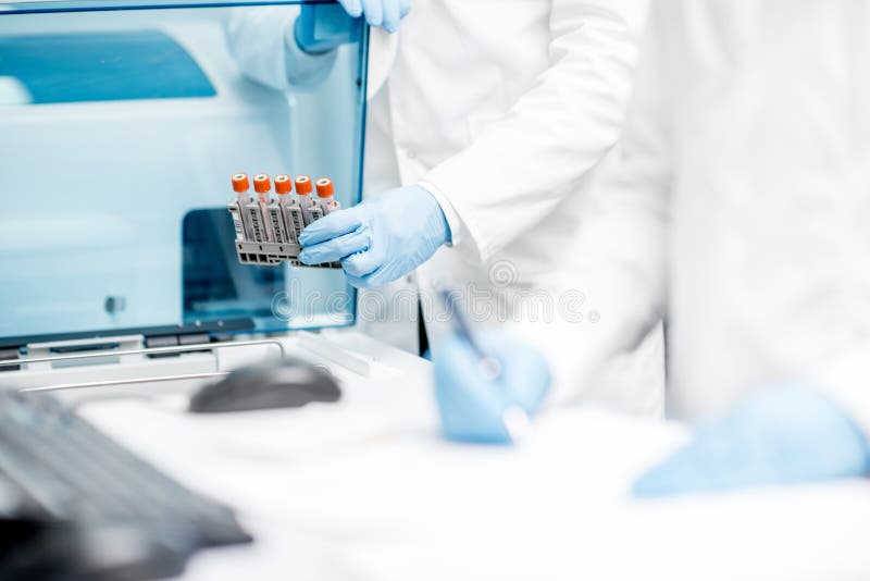 Filling Test Tubes into the Analyzer Machine Stock Image - Image of ...