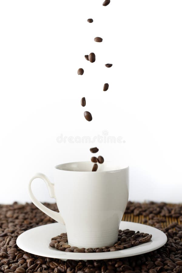 Filling up Coffee mug stock photo. Image of shiny, beans - 12121628