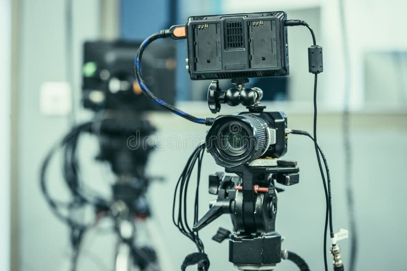 Professional Film Camera on a Tripod in Broadcasting Studio Stock Photo ...