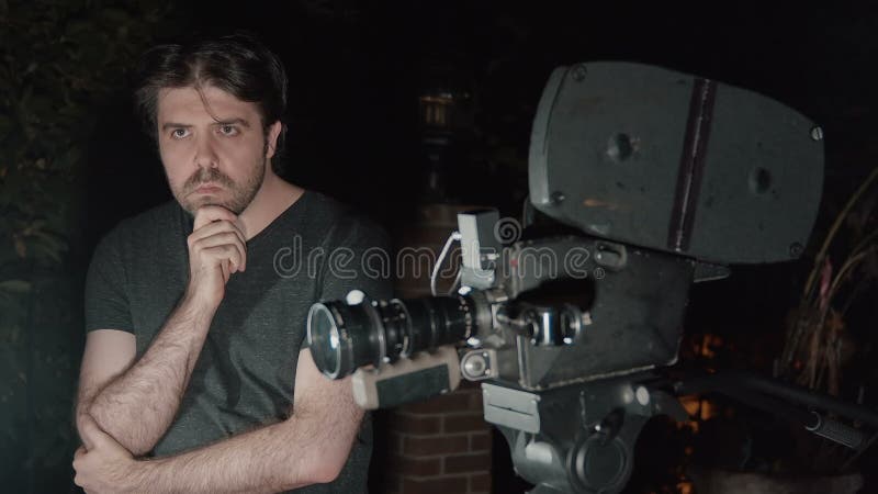 Film Maker Guy Director Thinking with Camera Stock Footage - Video of ...