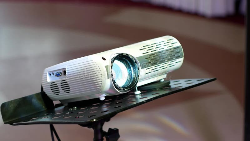 The Film Projector Broadcasts an Image on a White Screen Stock Footage ...