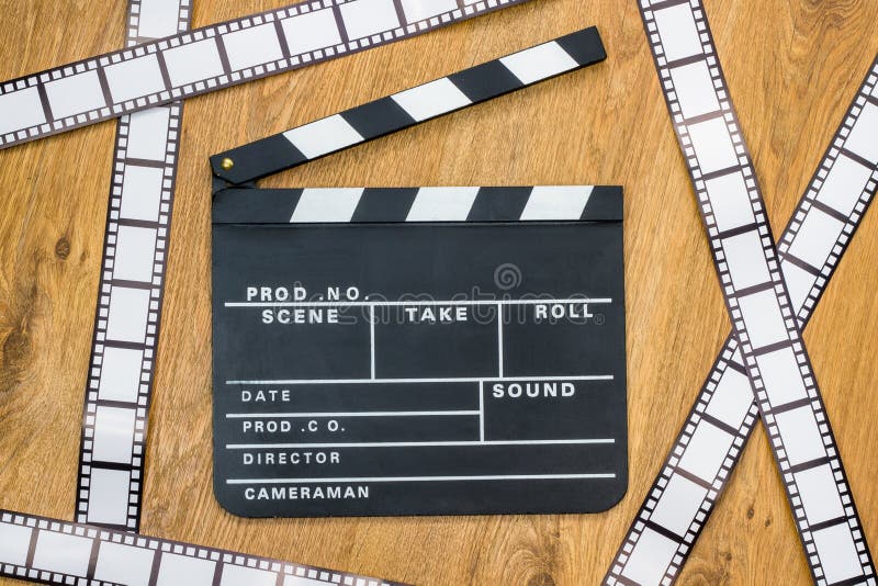 Movie Slate on a Wooden Background Stock Photo - Image of cinema ...
