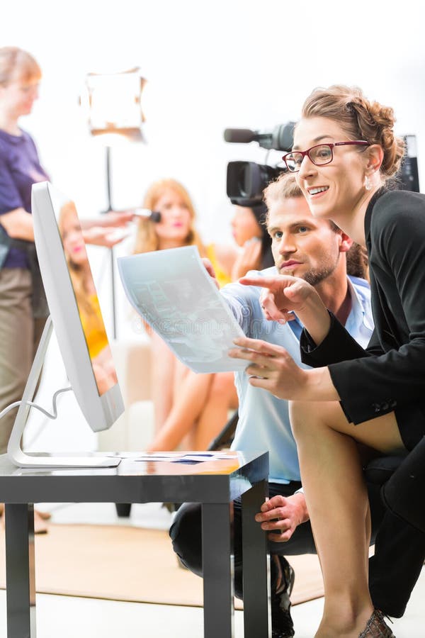 Film Team Discussing Direction for Video Production Stock Image - Image ...