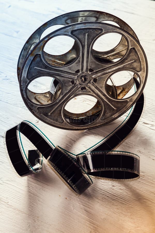 Vintage Roll of Film in Spotlight with Black Background Stock Image ...