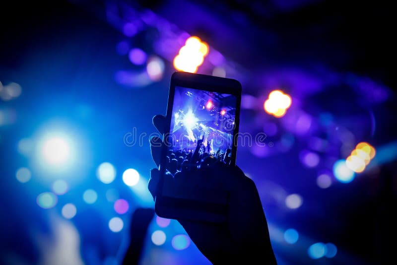 Filming a Concert on Mobile Phone Camera Stock Image - Image of concert ...