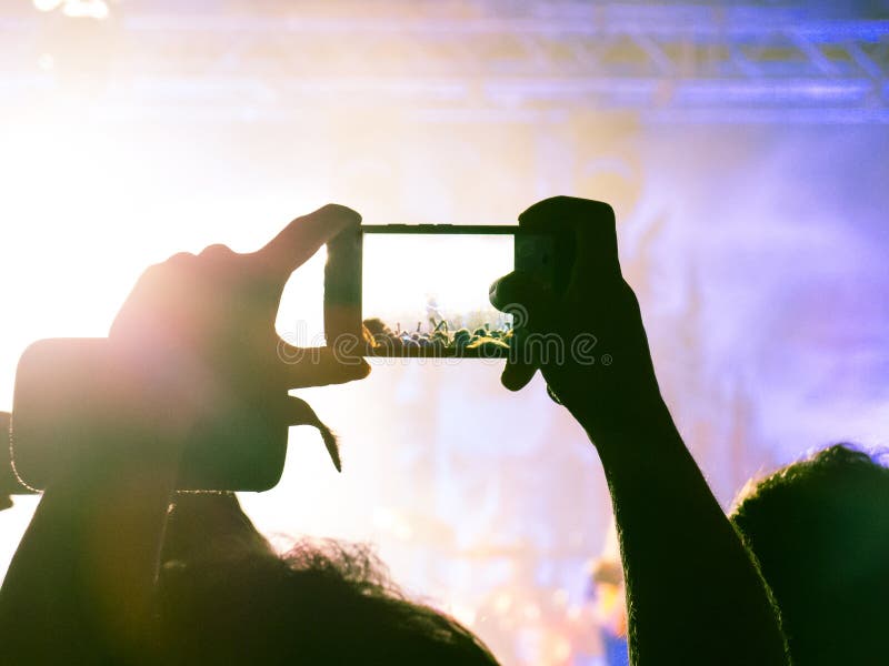 Filming Concert on Smartphone Stock Photo - Image of event, group ...