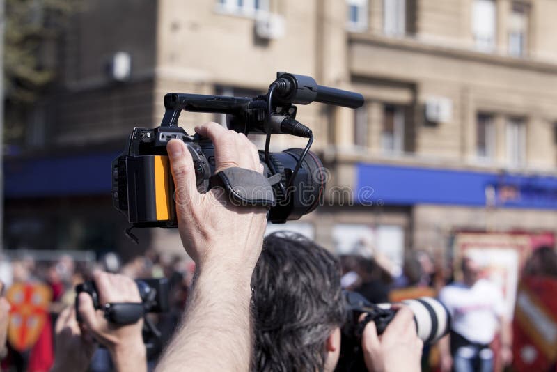 Filming an Event with a Video Camera Stock Image - Image of television ...