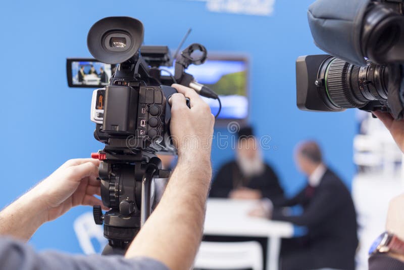 Filming an Event with a Video Camera Stock Photo - Image of broadcast ...