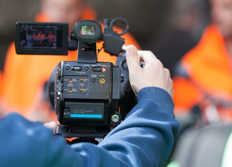 Filming an Event with a Video Camera Stock Image - Image of television ...