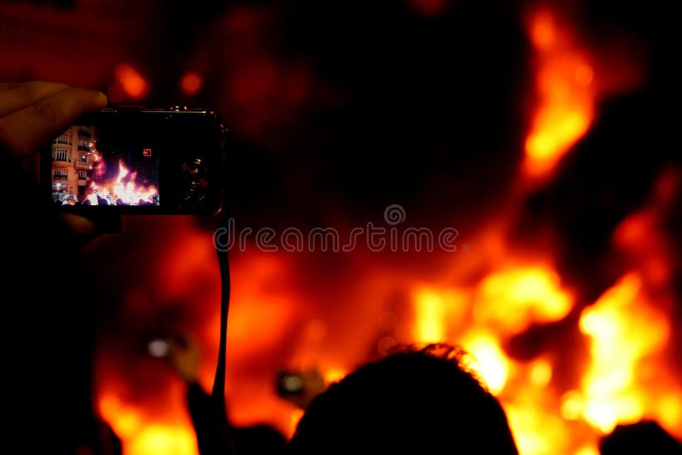 Filming the fire stock photo. Image of colored, crowd - 12443704