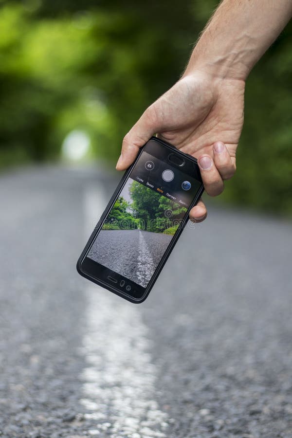 Filming on a Mobile Phone. Phone in Hand Stock Photo - Image of mount ...